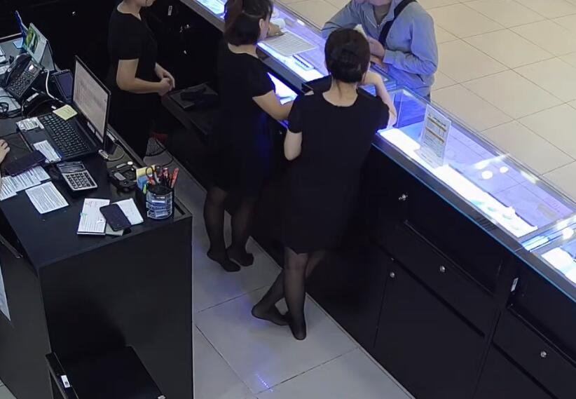 The jewelry store hostess in black nylon show us her cute feet! 293